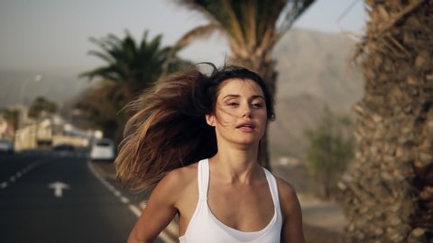 Long Haired Road Runner Woman Running Stock Footage Video (100% Royalty ...