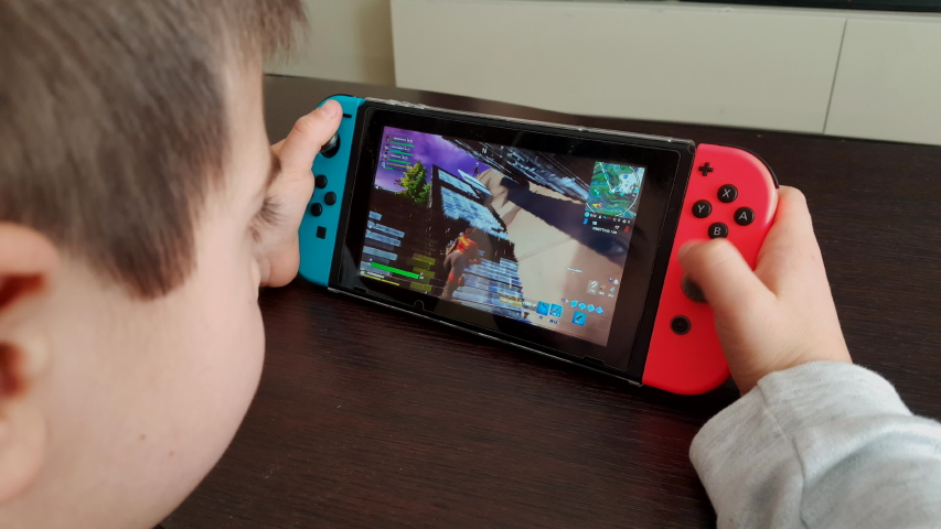 children playing fortnite game on nintendo Stock Footage Video (100% ...