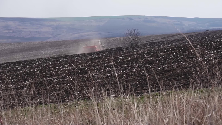 tractor mounted seeder performing direct seeding Stock Footage Video ...