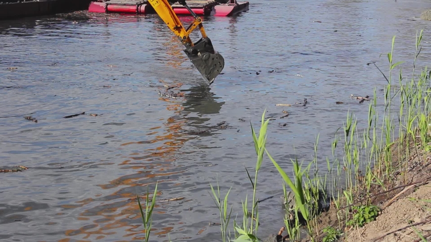 excavator dredge dredging working on river Stock Footage Video (100% ...