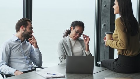 Young Smiling Colleagues Talking Each Other Stock Footage Video (100% ...