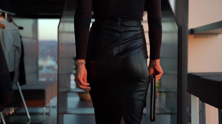 rear view lady boss black leather Stock Footage Video (100% Royalty ...