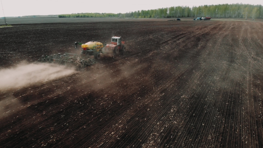 rapidly moving part earth-harrowing machine harrowing Stock Footage ...