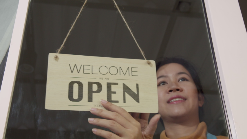 small business owner smiling while turning Stock Footage Video (100% ...