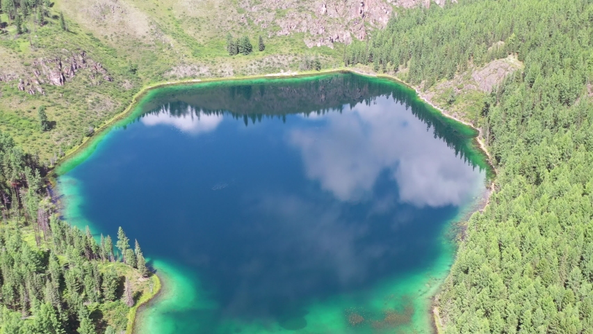 Scenery with lake reflections with clouds in the sky image - Free stock ...