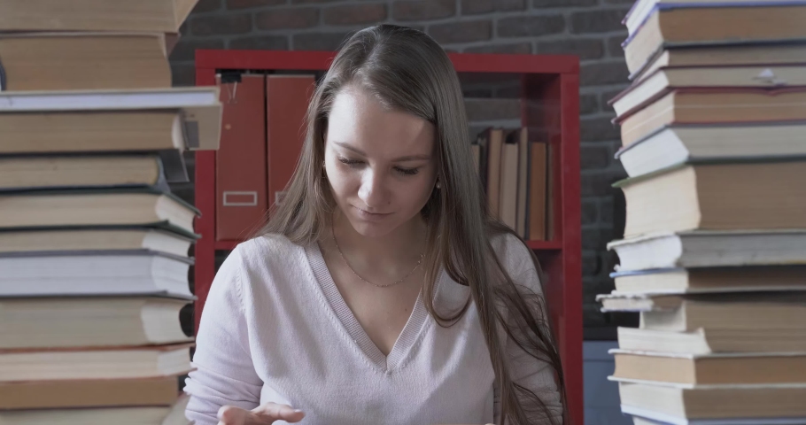 girl studying hard sitting library many Stock Footage Video (100% ...