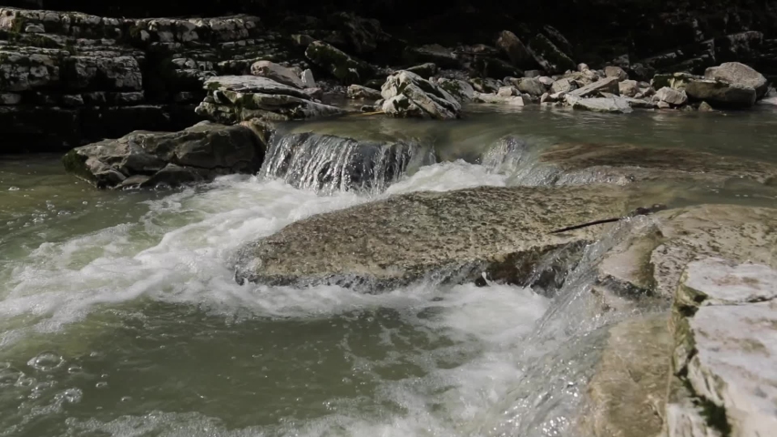 Clean Water Flow in Rocky Stock Footage Video (100% Royalty-free ...