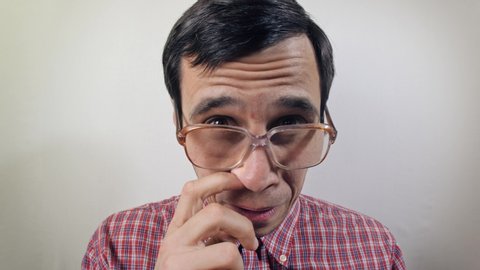 Nerd Picking His Nose Looks Around Stock Footage Video (100% Royalty ...