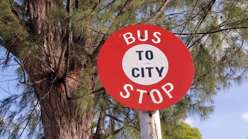 Red Bus Stop Sign to Stock Footage Video (100% Royalty-free) 1052783756 ...