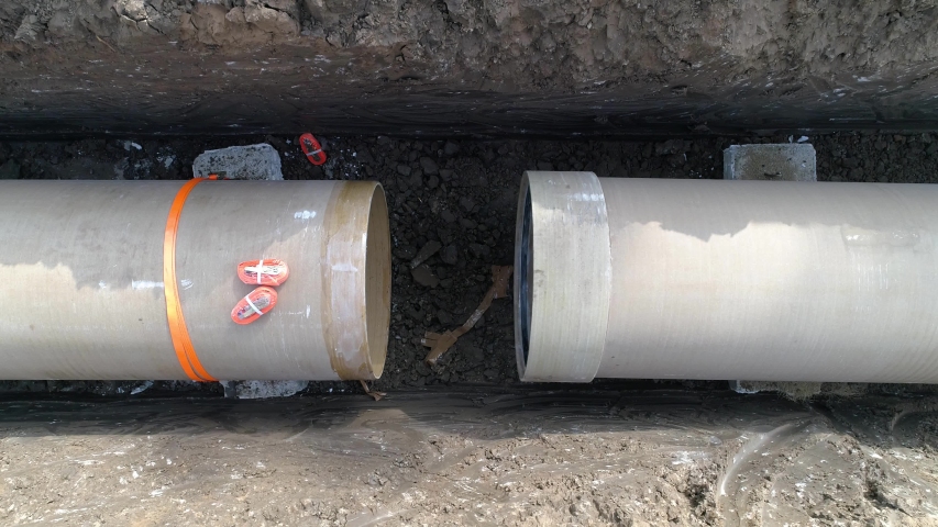 concrete pipe tube installation aerial above Stock Footage Video (100% ...