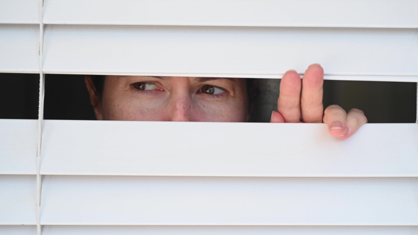 close-up woman's eye looking out into Stock Footage Video (100% Royalty ...