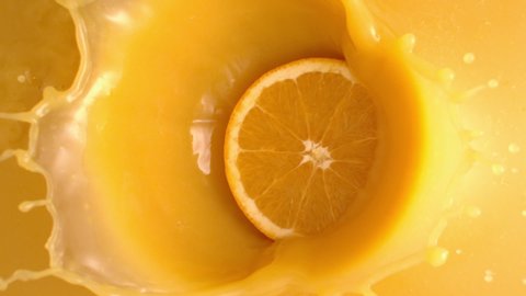 Slice Orange Falling Into Juice Slow Stock Footage Video (100% Royalty ...
