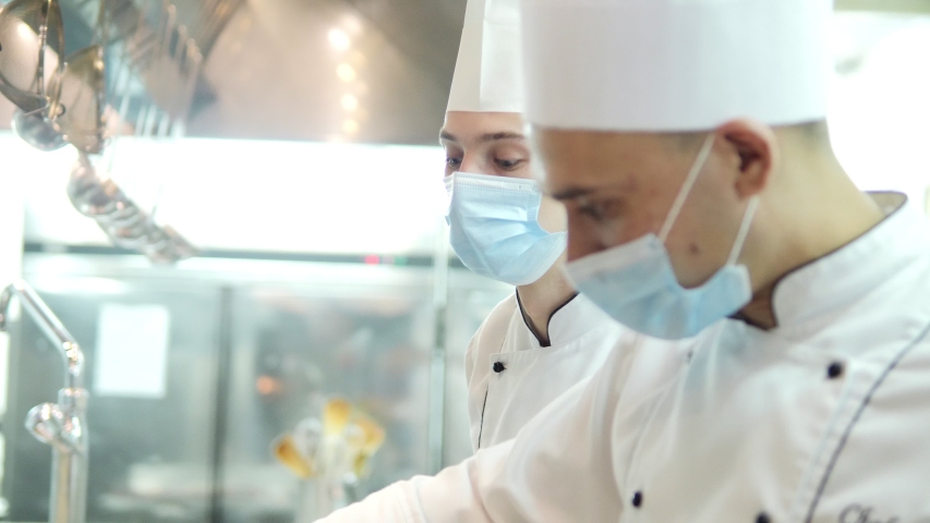 Chefs in Protective Masks and Stock Footage Video (100% Royalty-free ...
