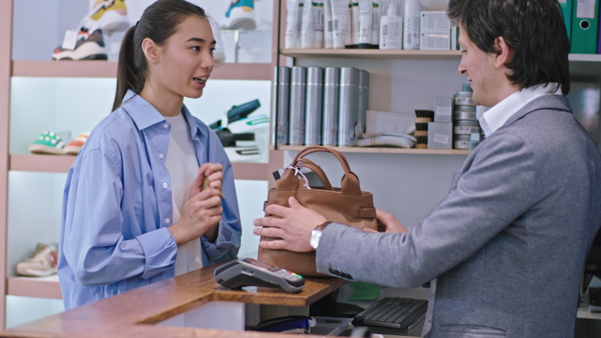 Asian Lady Customer in a Stock Footage Video (100% Royalty-free ...