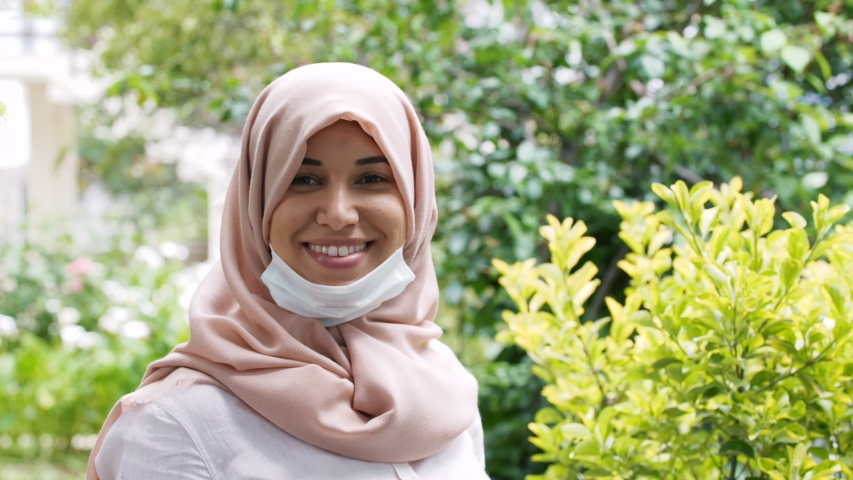 masked muslim woman mask attached motion Stock Footage Video (100% ...