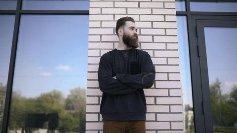 man looking out window watching heavy Stock Footage Video (100% Royalty ...