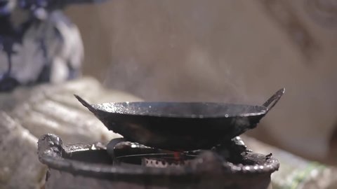 Batik Ink Being Heated Using Stove Stock Footage Video (100% Royalty ...