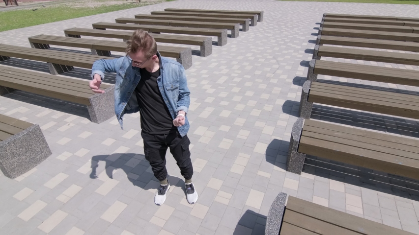 young guy dancing street dance park Stock Footage Video (100% Royalty ...