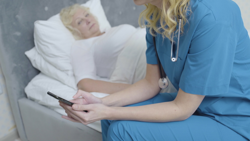 Careless Nurse Ignoring Sick Elderly Patient Stock Footage Video (100% ...