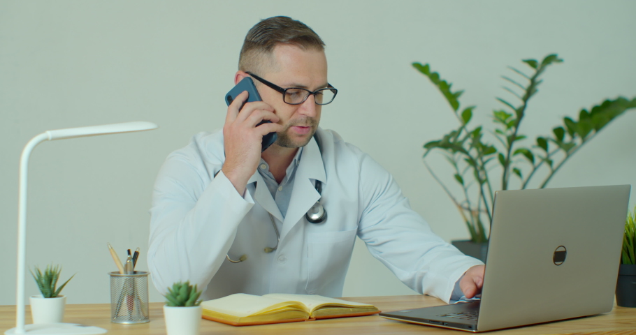 Male Doctor Does Call Consultation, Stock Footage Video (100% Royalty ...