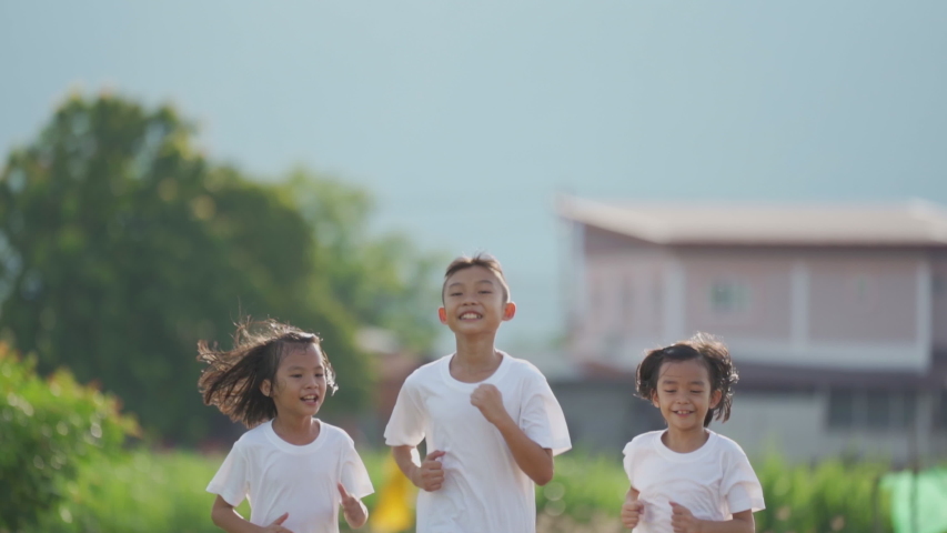 slow motion kids playing running on Stock Footage Video (100% Royalty ...