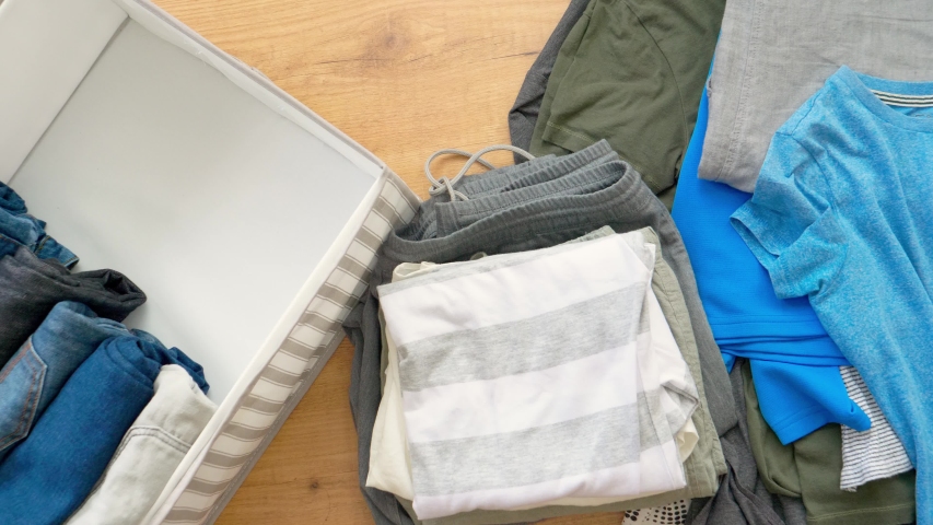 Folded Shirts Top View Stock Video Footage - 4K and HD Video Clips ...