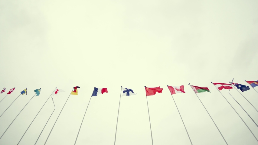 various world flags flying on flagpoles Stock Footage Video (100% ...