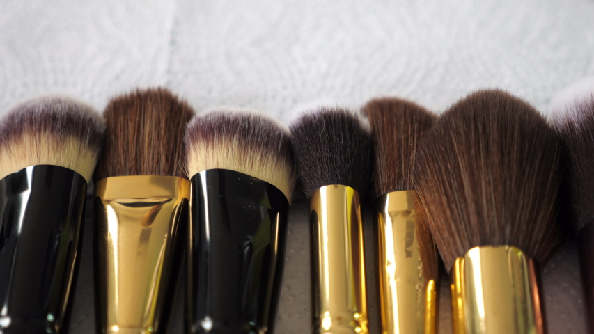 Airbrush spray water into camera slow motion 4K. Static shot of ...