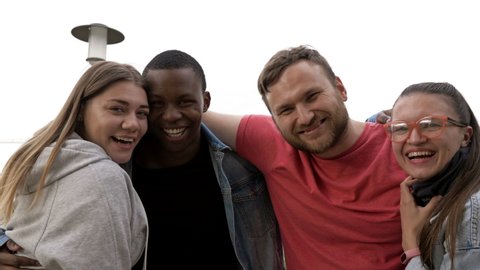 Four People Different Nationalities Stand Embracing Stock Footage Video ...