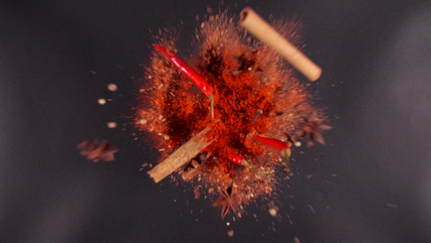 exotic spices chilli pepper flying falling Stock Footage Video (100% ...