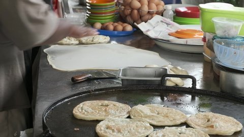 Roti canai Stock Video Footage - 4K and HD Video Clips | Shutterstock