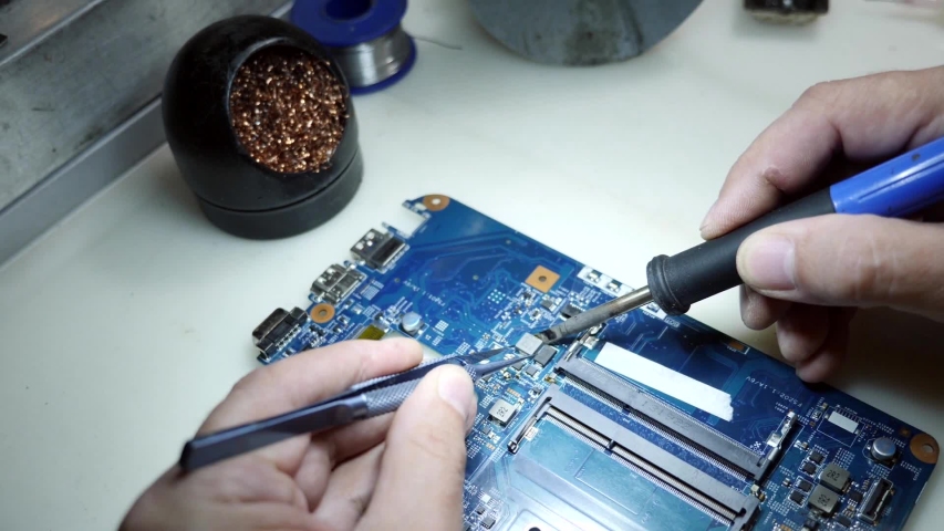 soldering computer board laptop repair Stock Footage Video (100% ...