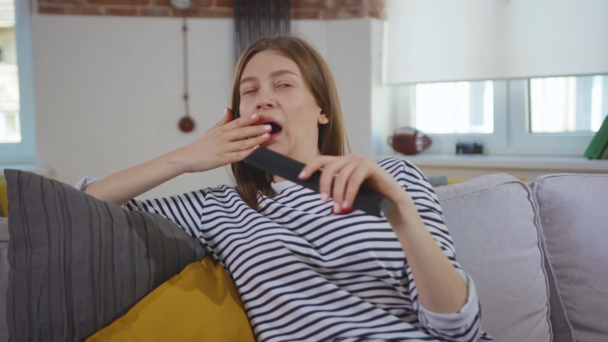 attractive young woman watching tv feel Stock Footage Video (100% ...