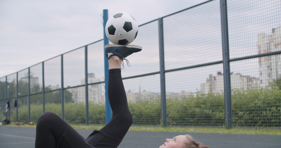 young caucasian girl practicing soccer skills Stock Footage Video (100% ...