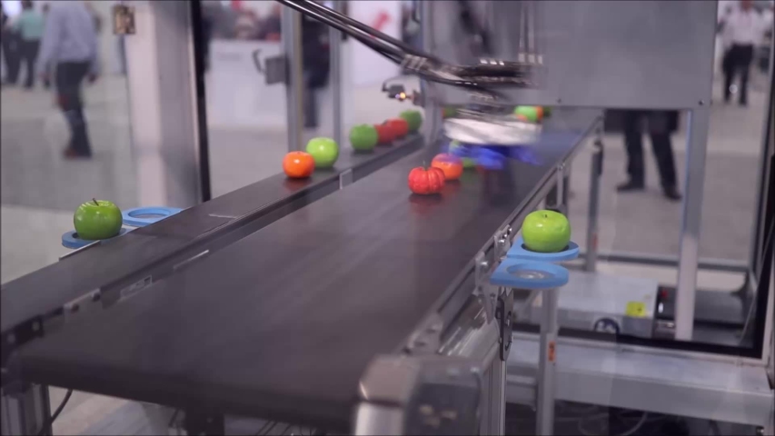 Robot Sorting Oranges Green Apples While Stock Footage Video (100% ...