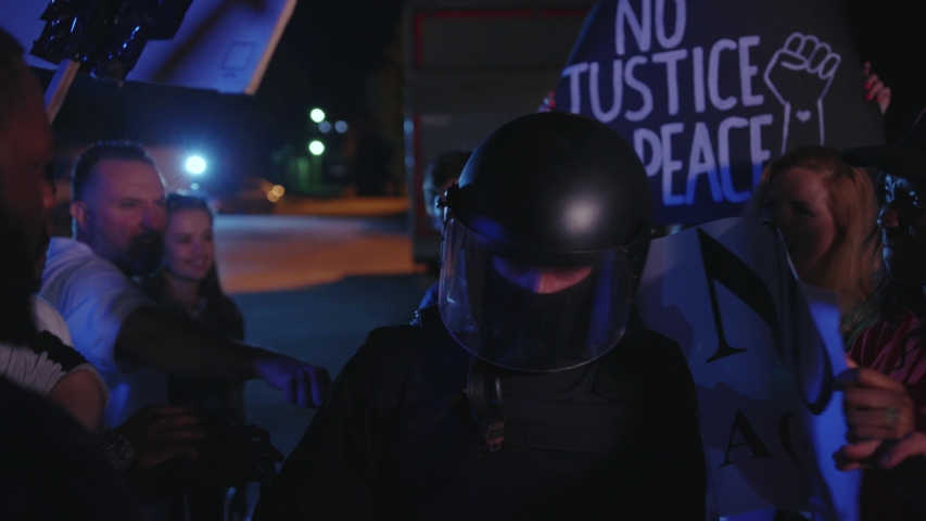 violent street protesters fight policeman on Stock Footage Video (100% ...