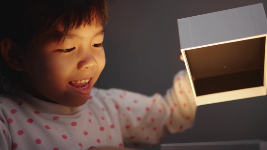 little girl open looks box surprised Stock Footage Video (100% Royalty ...