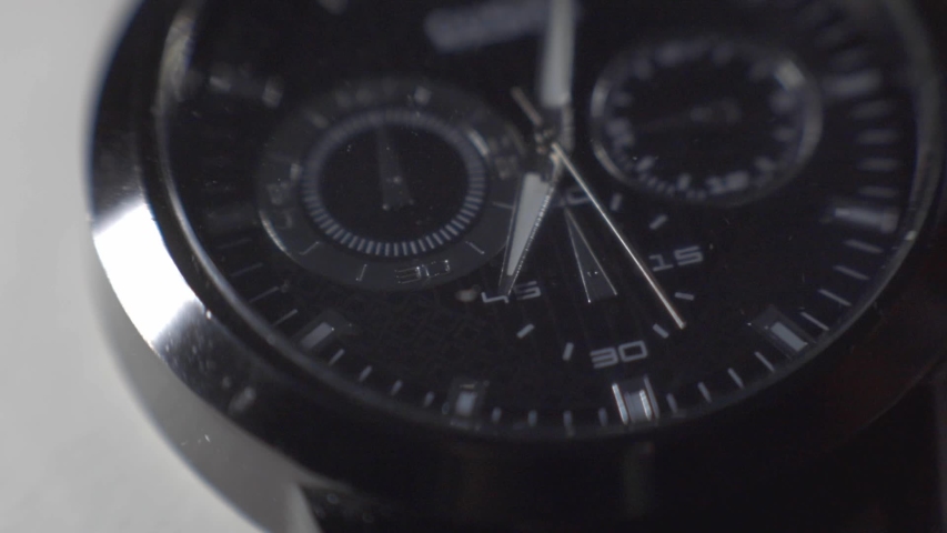 spotlight passing through glass man's watch Stock Footage Video (100% ...