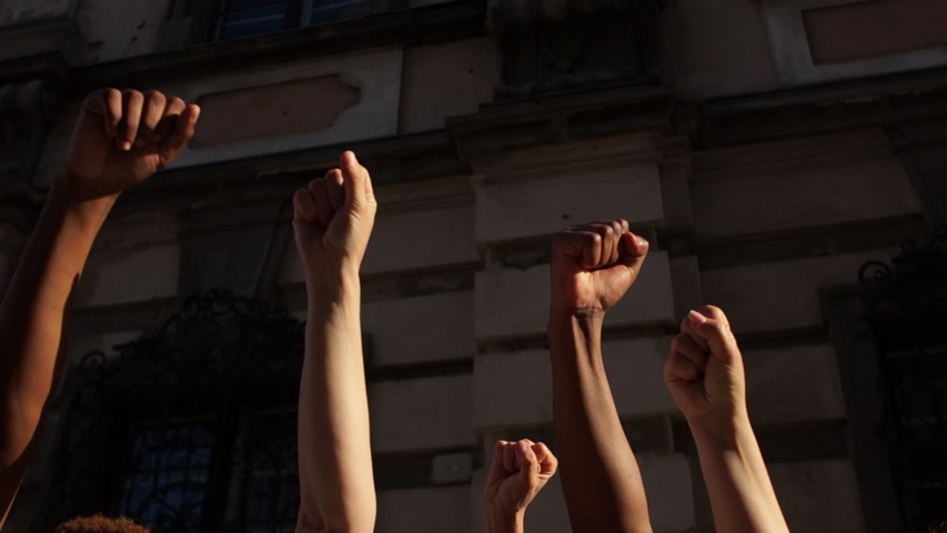 clenched fists raised air violence protests Stock Footage Video (100% ...