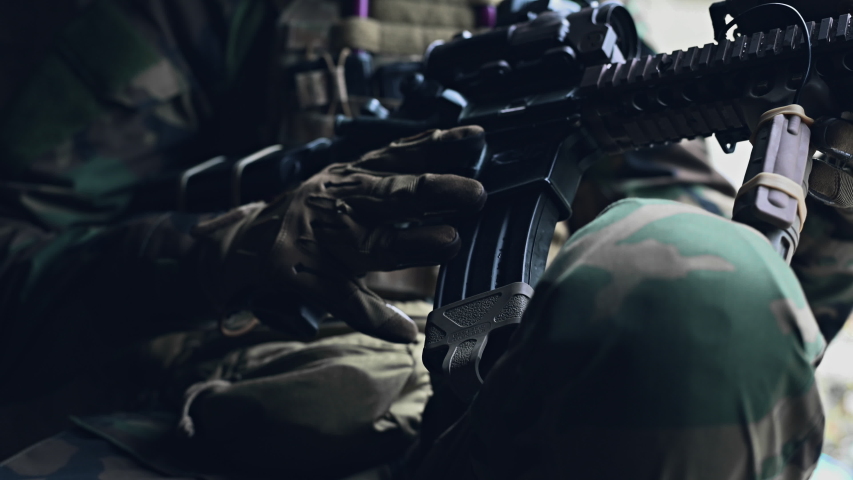 weapon inspection while waiting on spot Stock Footage Video (100% ...