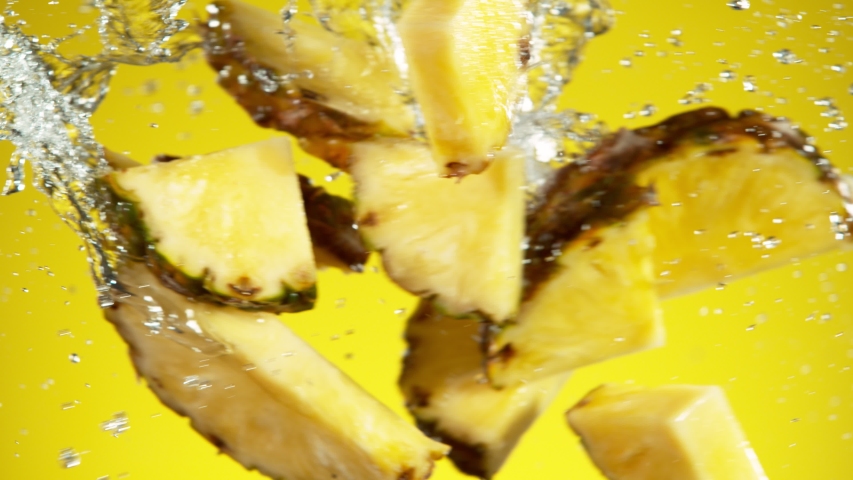super slow motion pineapple slices collision Stock Footage Video (100% Royalty-free) 1057207918 ...