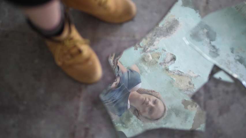 young woman smashing pieces mirror showing Stock-video (100 % ...