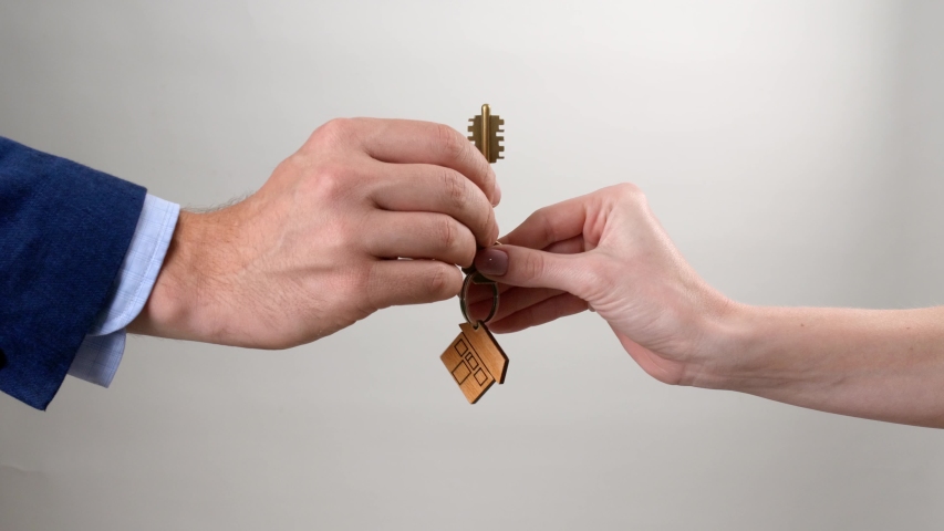Man Handing Key to Woman Stock Footage Video (100% Royalty-free ...