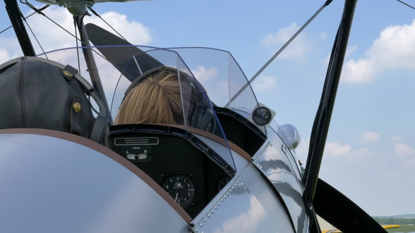 point view open-cockpit bi-plane aircraft while Stock Footage Video ...