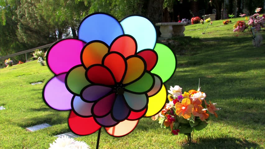 toy windmill decorating grave on pet Stock Footage Video (100% Royalty ...