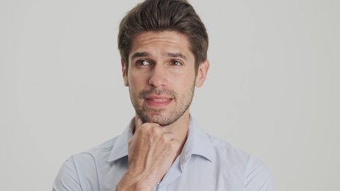 Quizzical Man Raising Eyebrow Portrait Stock Photo (Edit Now) 451135087