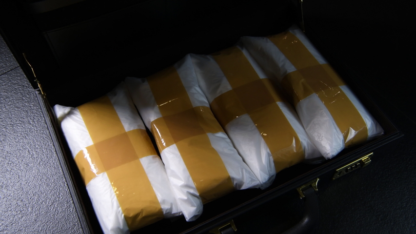hand packing narcotic drugs money briefcase Stock Footage Video (100% ...