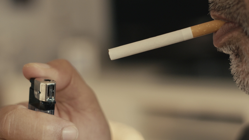 man lights cigarette lighter Stock Footage Video (100% Royalty-free ...