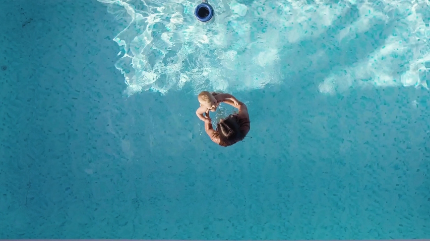 Swimming Pool Birds Eye View 스톡 비디오 동영상 - 4K/HD 비디오 클립 | Shutterstock