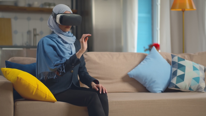 muslim woman wearing hijab using vr Stock Footage Video (100% Royalty ...